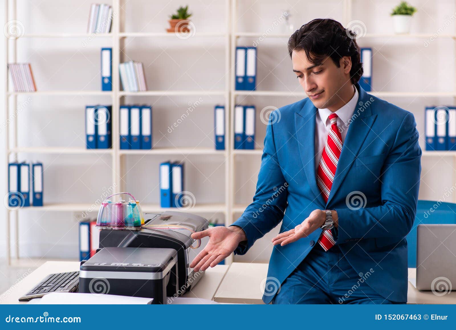 Young Employee Making Copies at Copying Machine Stock Image - Image of ...