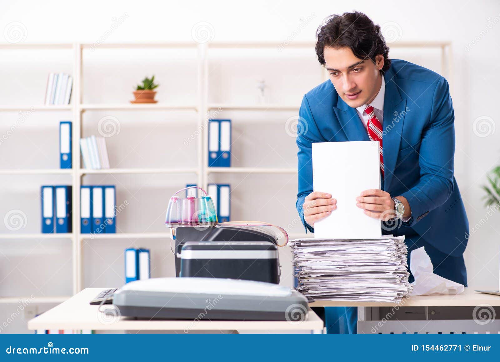 Young Employee Making Copies at Copying Machine Stock Image - Image of ...