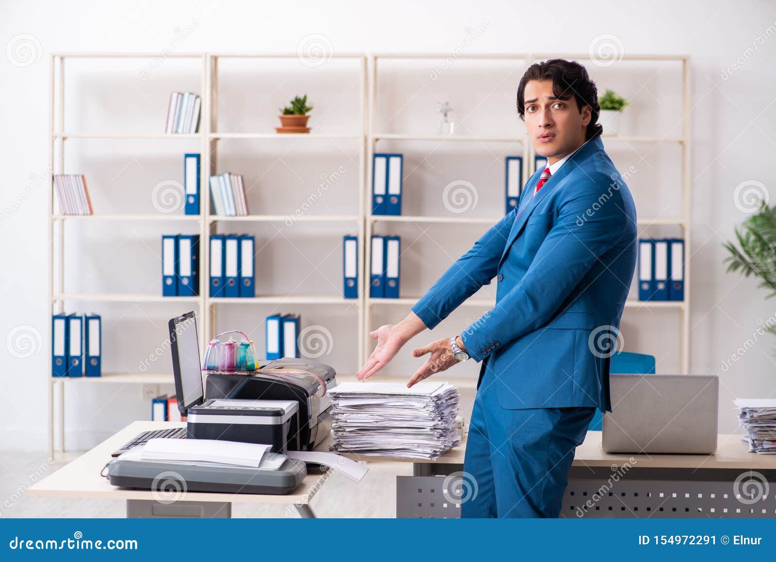Young Employee Making Copies at Copying Machine Stock Image - Image of ...