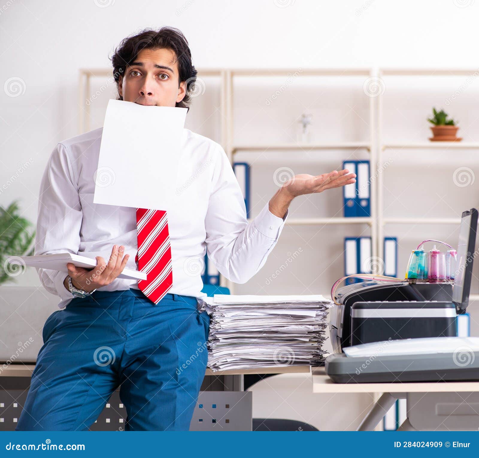 Young Employee Making Copies at Copying Machine Stock Image - Image of ...