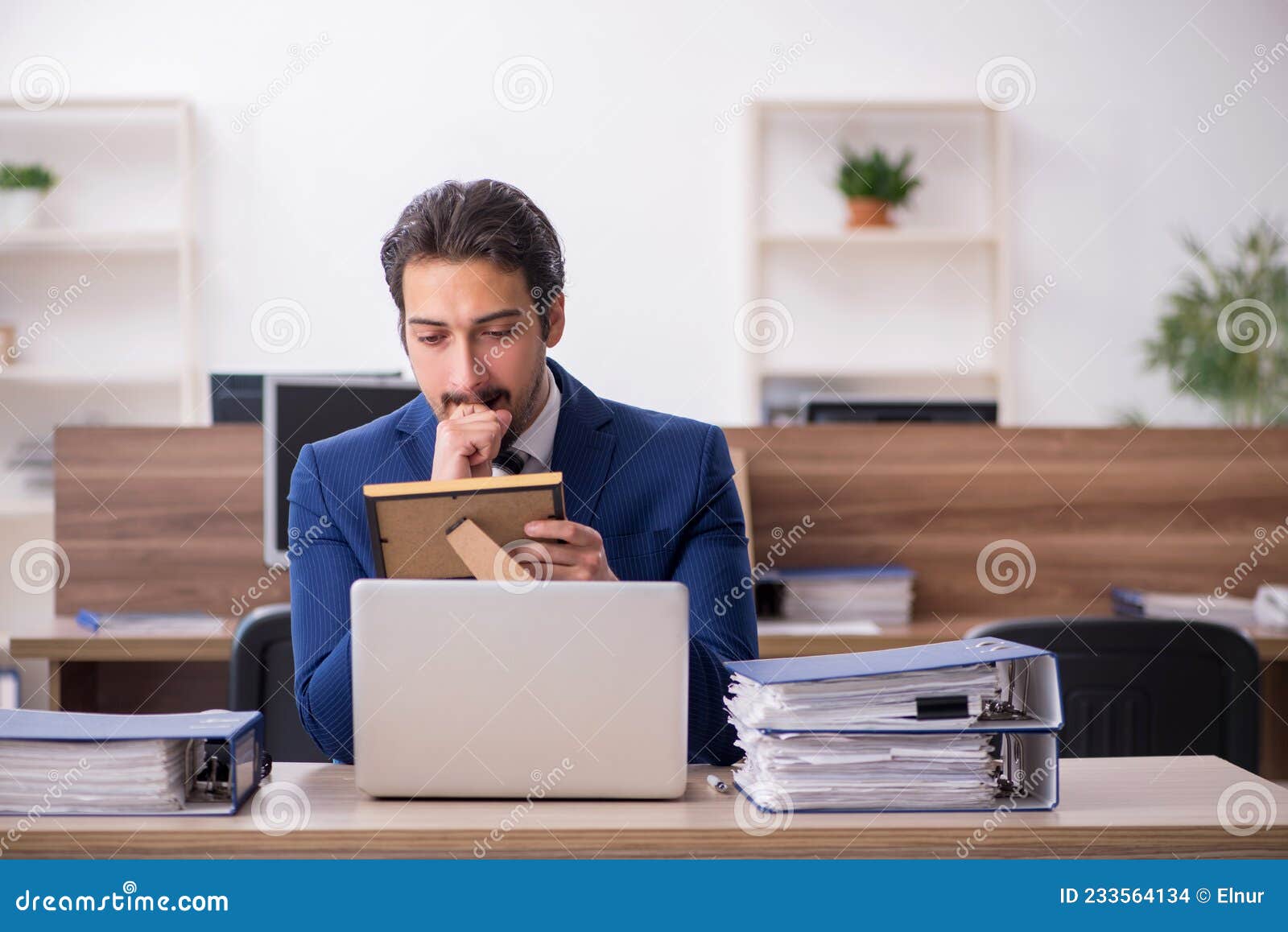 Young Male Employee Missing Girlfriend at Workplace Stock Photo - Image ...