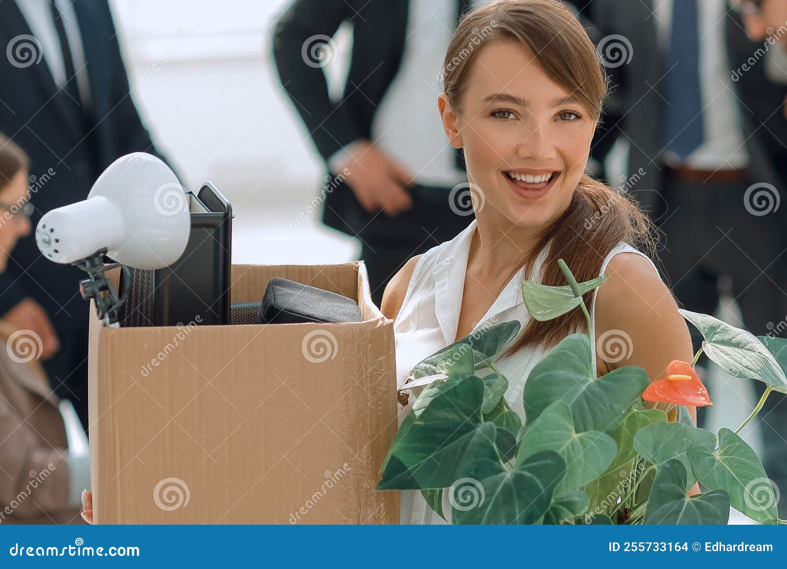 Young Employee with Personal Things on the Background of the Office ...