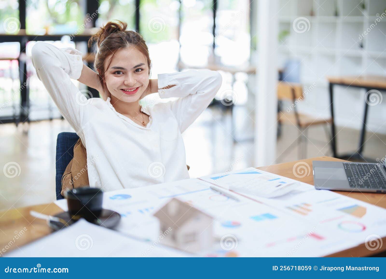 Young Employee Showing a Smile and a Relaxed Expression after Work ...