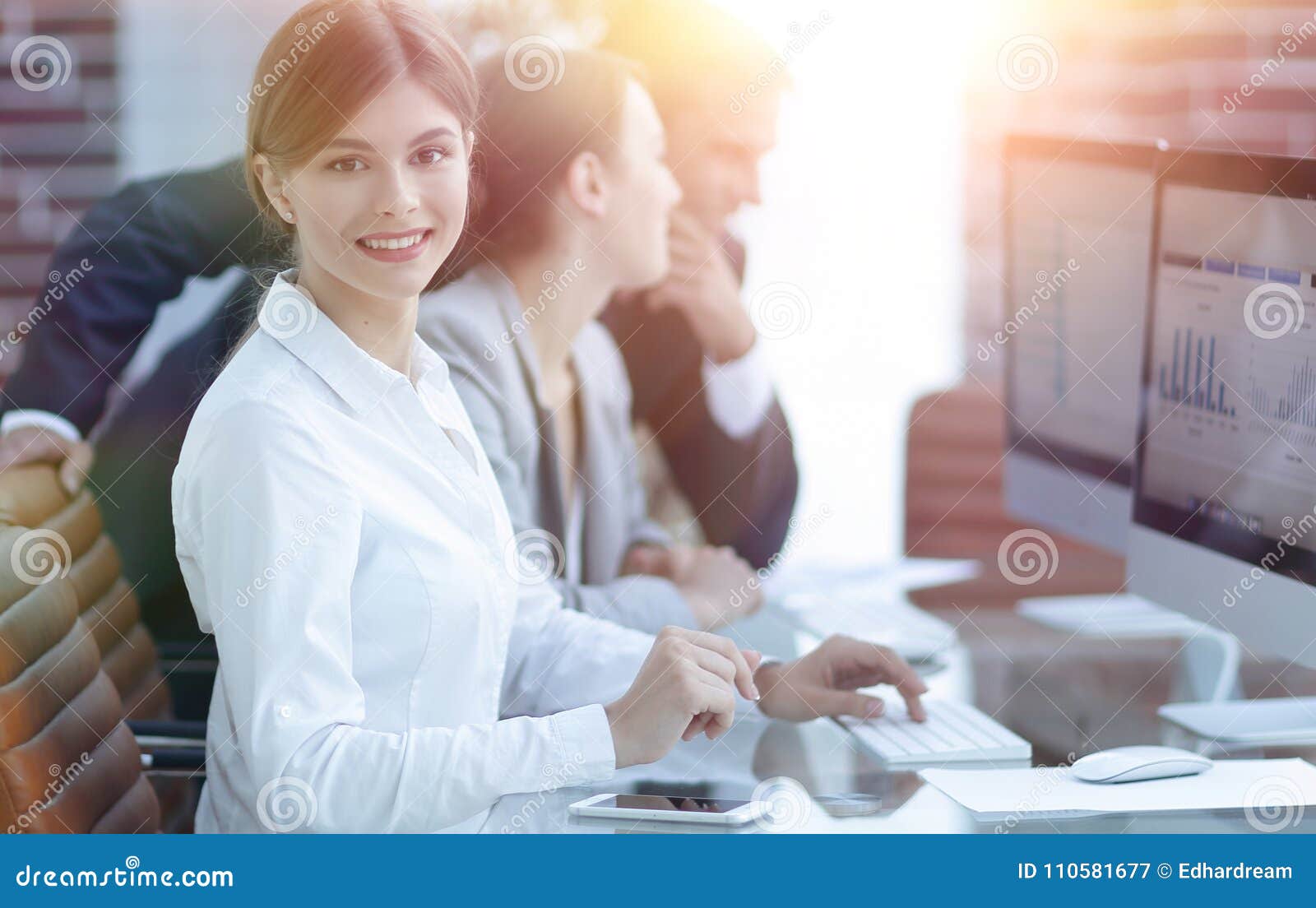 Young Employee Sitting at a Desk Stock Image - Image of person ...