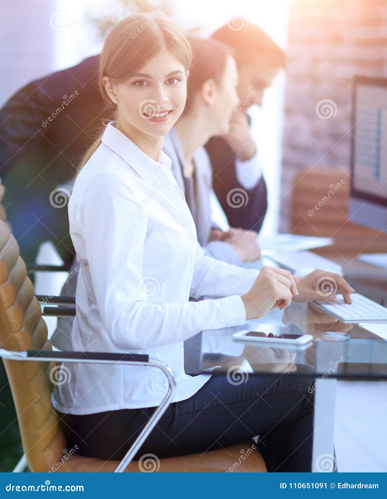 Young Employee Sitting at a Desk Stock Image - Image of indoor, people ...