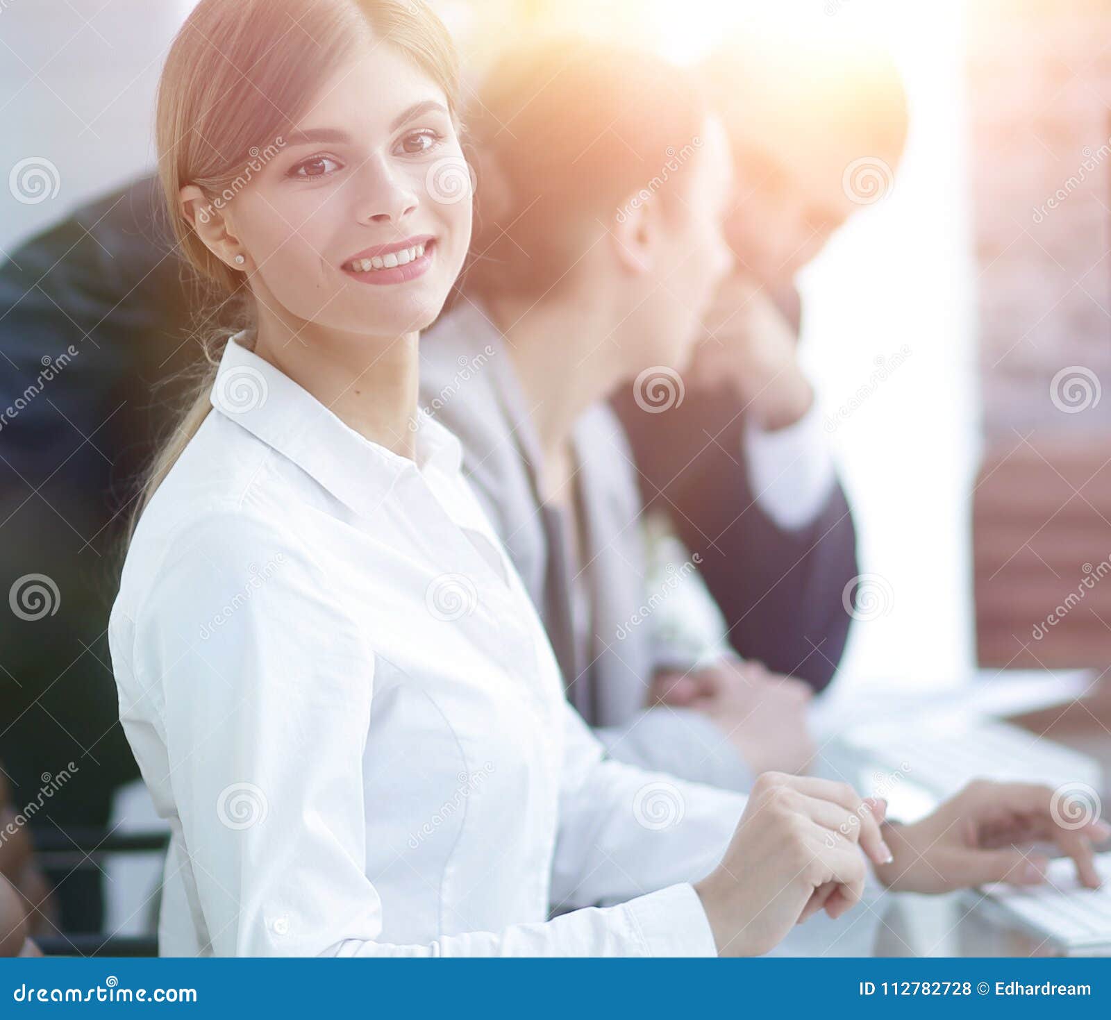 Young Employee Sitting at a Desk Stock Photo - Image of desk, executive ...