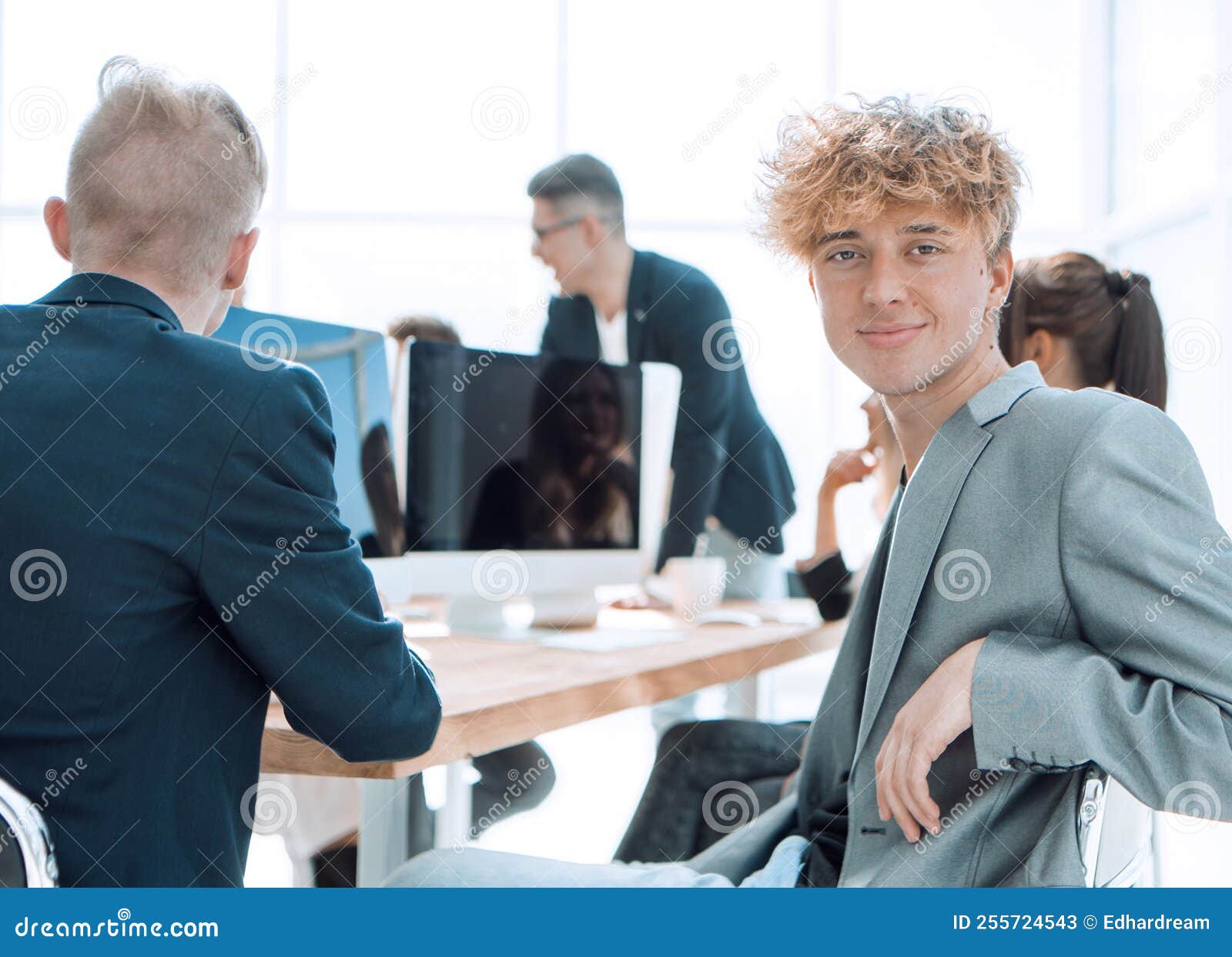 Young Employee Sitting at a Table during a Work Meeting. Stock Image ...