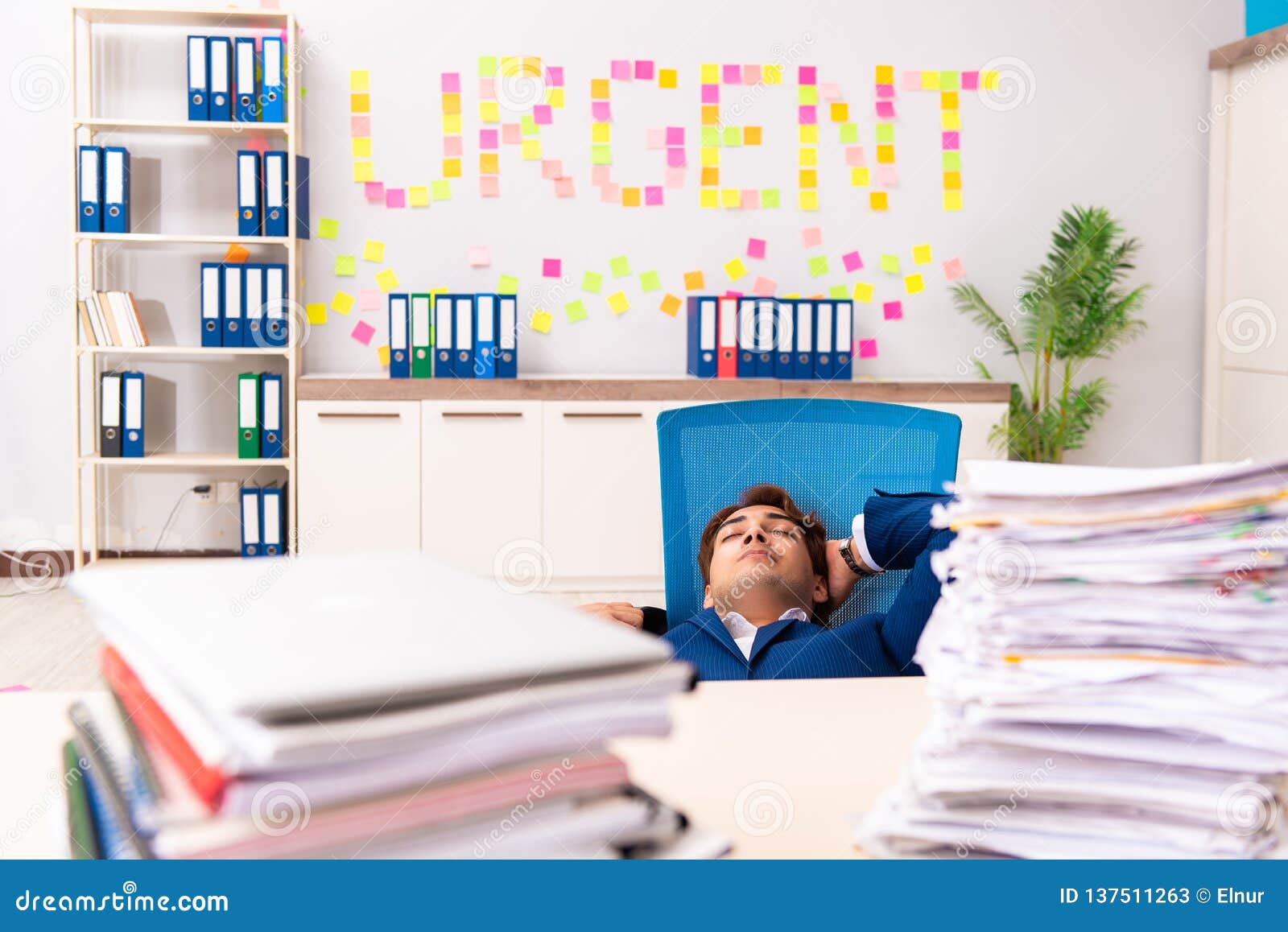 The Young Employee Suffering from Excessive Work Stock Image - Image of ...