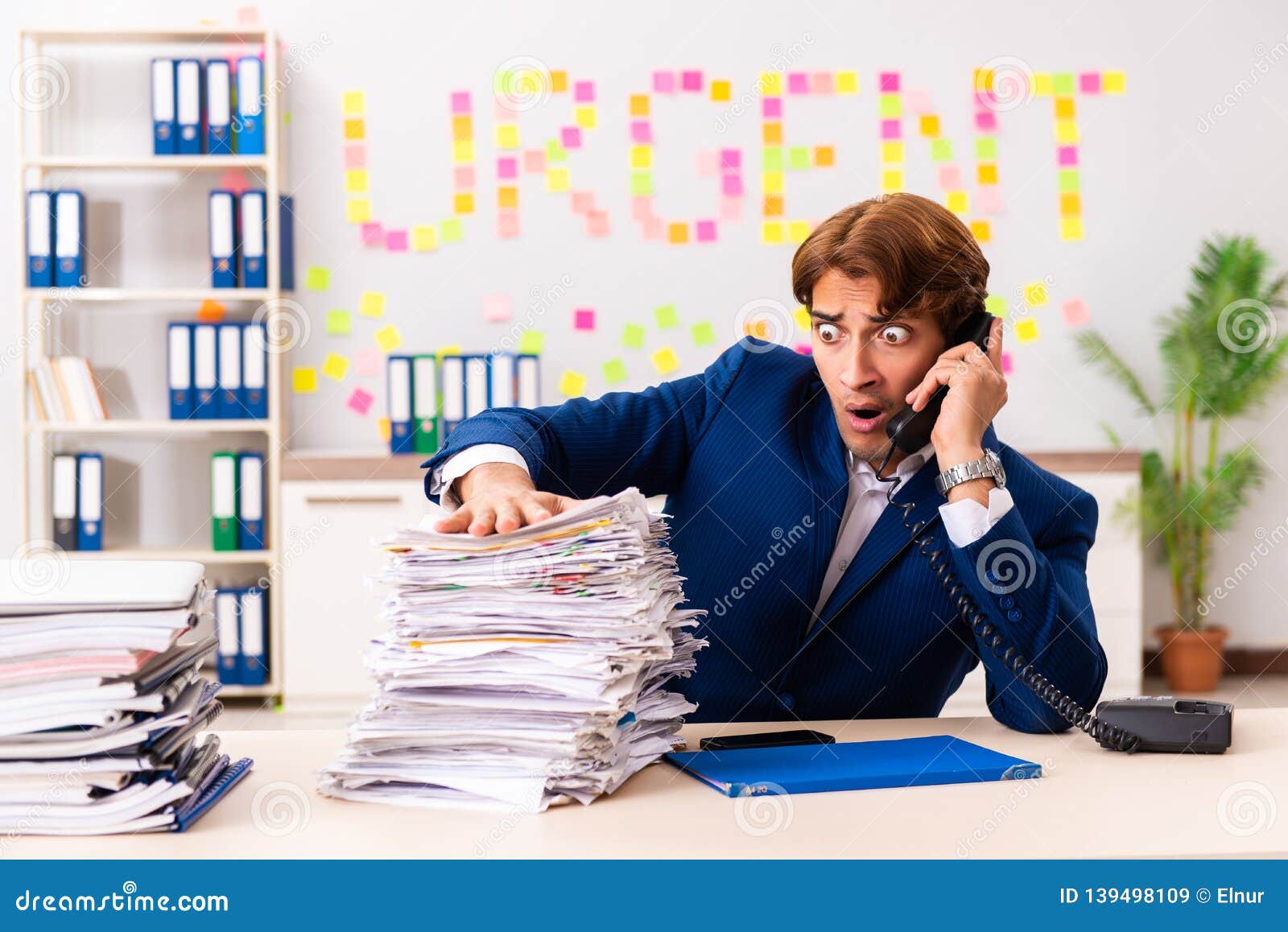 The Young Employee Suffering from Excessive Work Stock Image - Image of ...