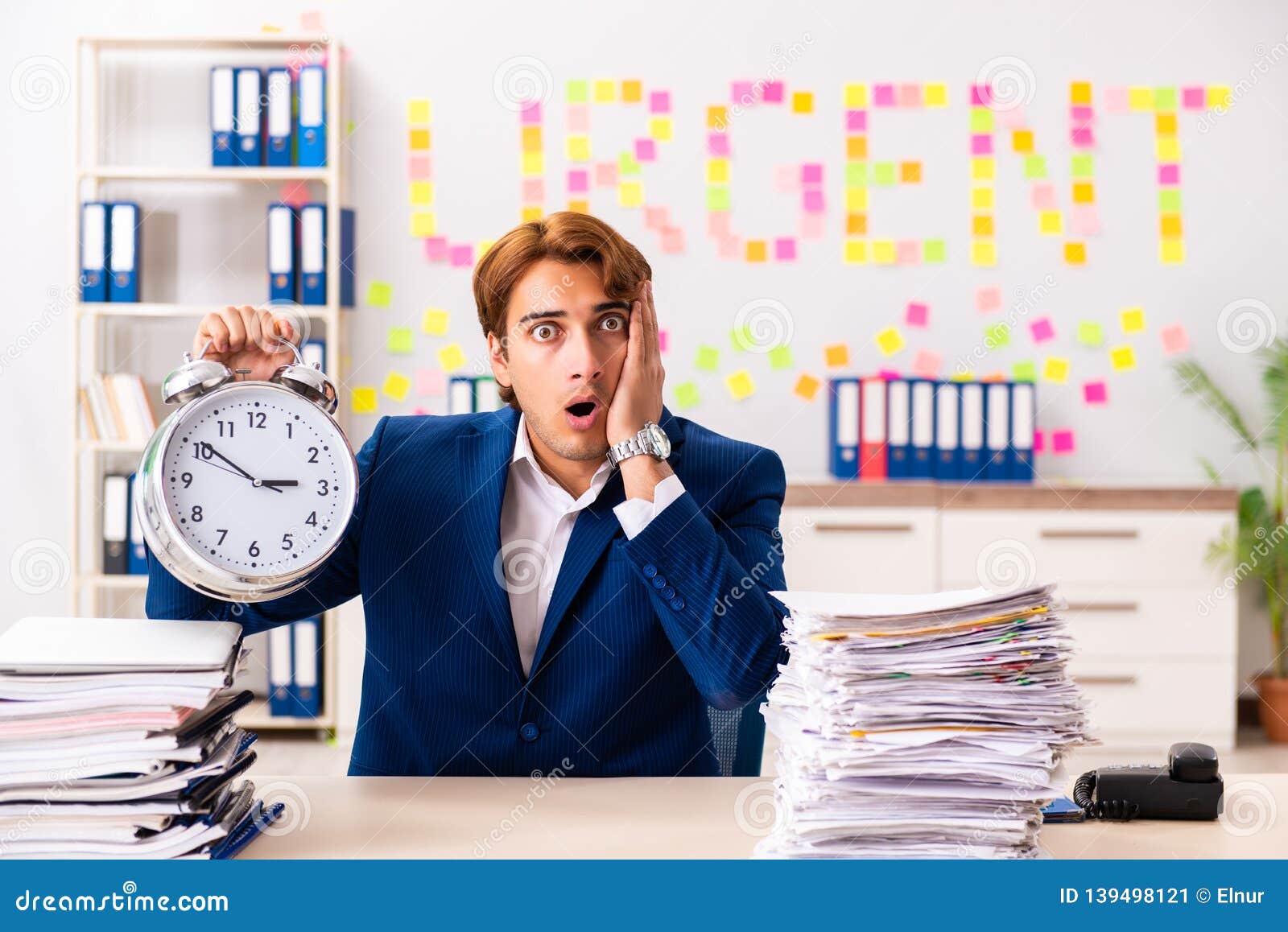 The Young Employee Suffering from Excessive Work Stock Image - Image of ...