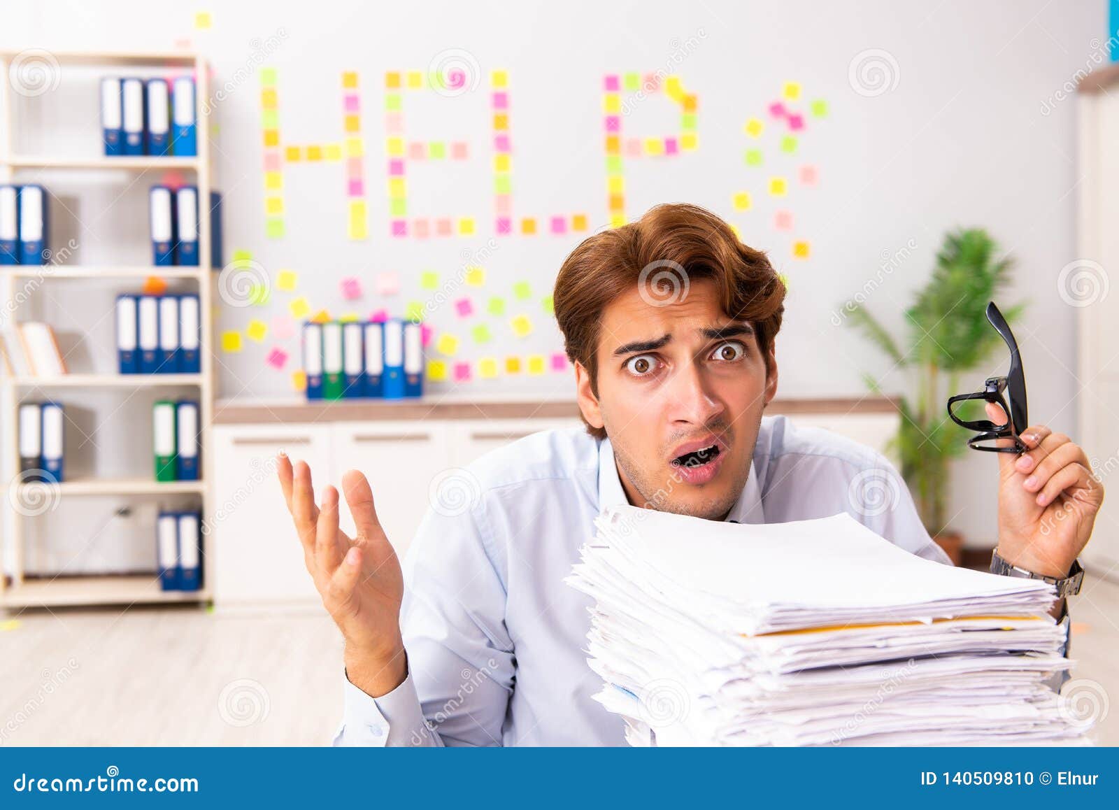 The Young Employee Suffering from Excessive Work Stock Photo - Image of ...