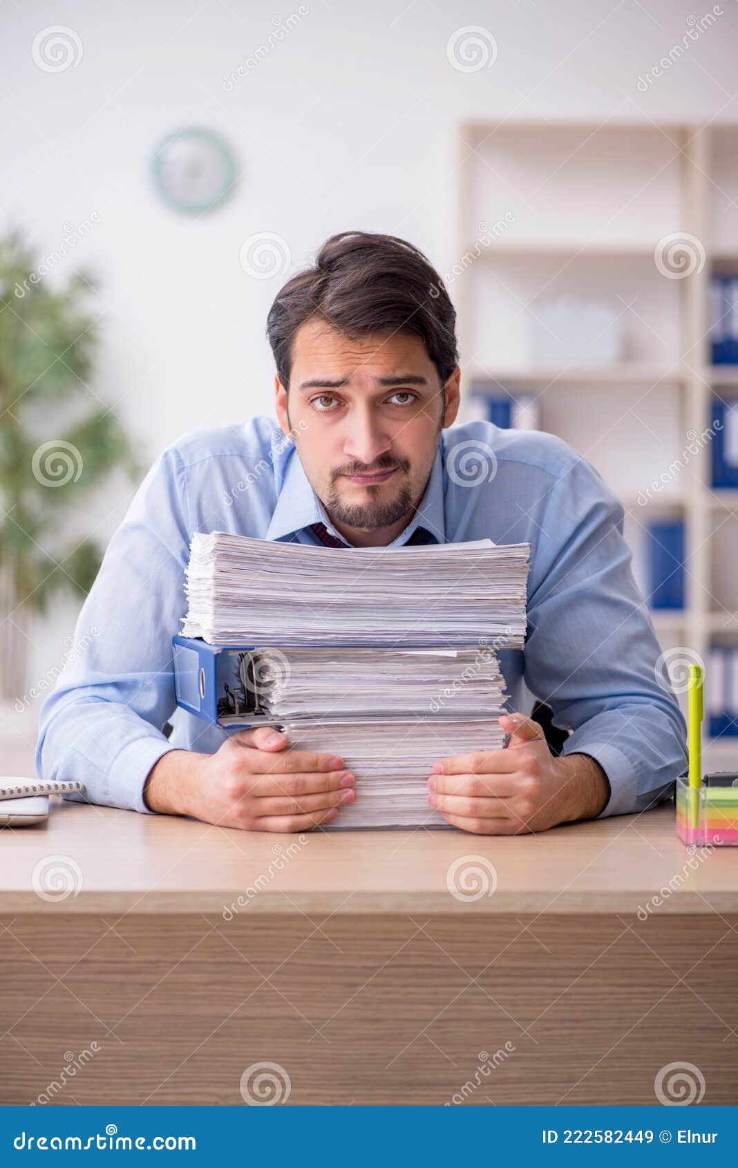 Young Male Employee and Too Much Work in the Office Stock Image - Image ...