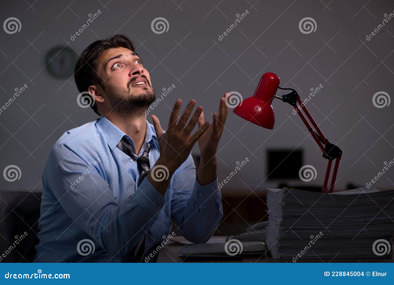 Young Male Employee Working Late in the Office Stock Photo - Image of ...