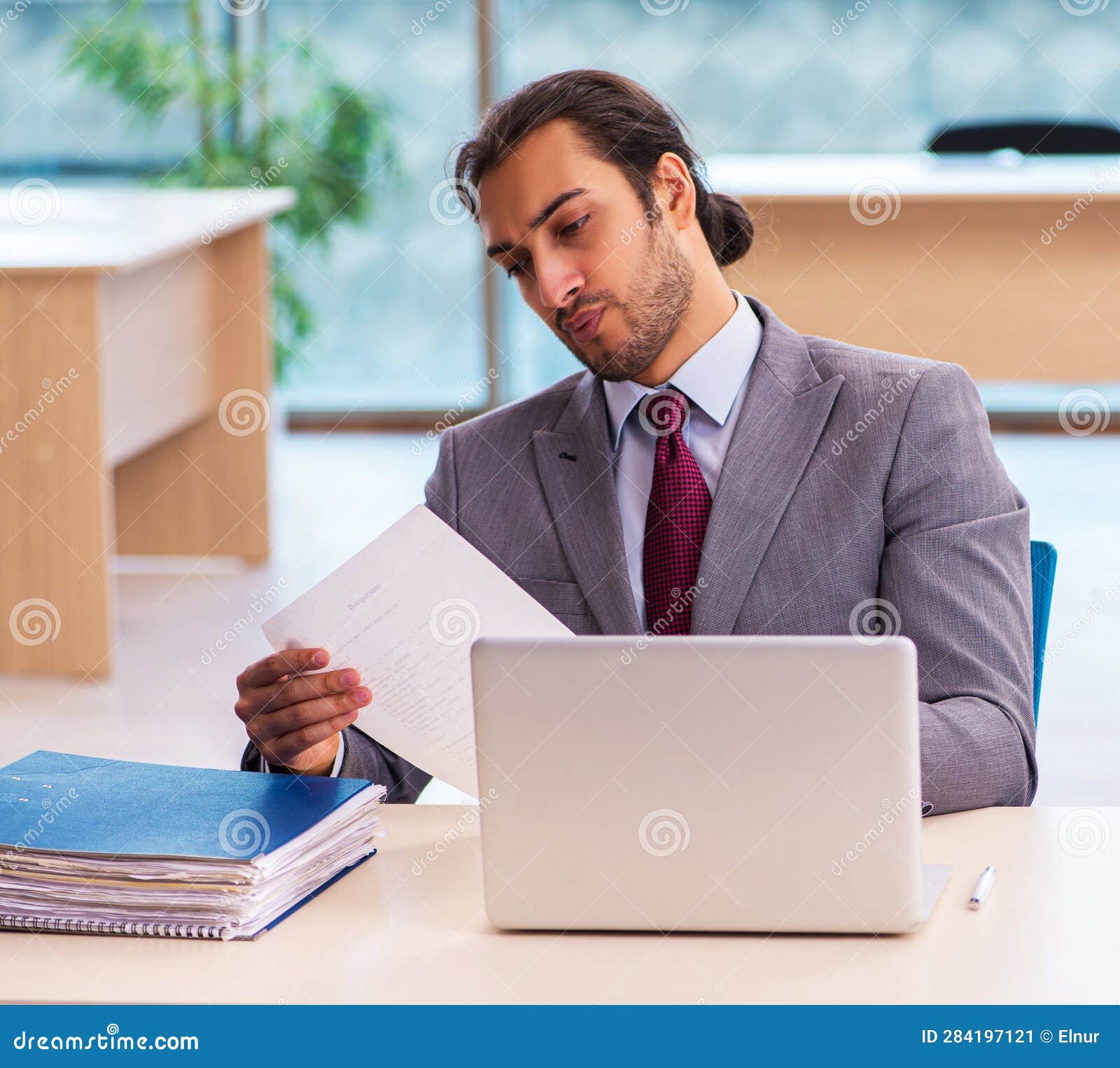 Young Male Employee Working in the Office Stock Image - Image of ...