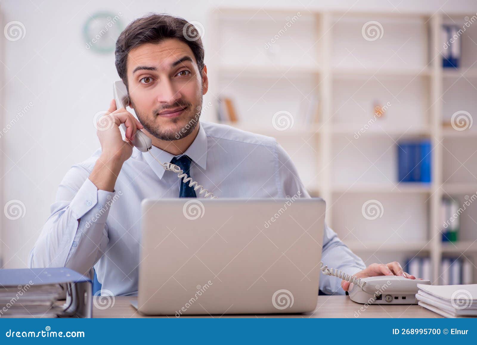Young Male Employee Working in the Office Stock Photo - Image of ...