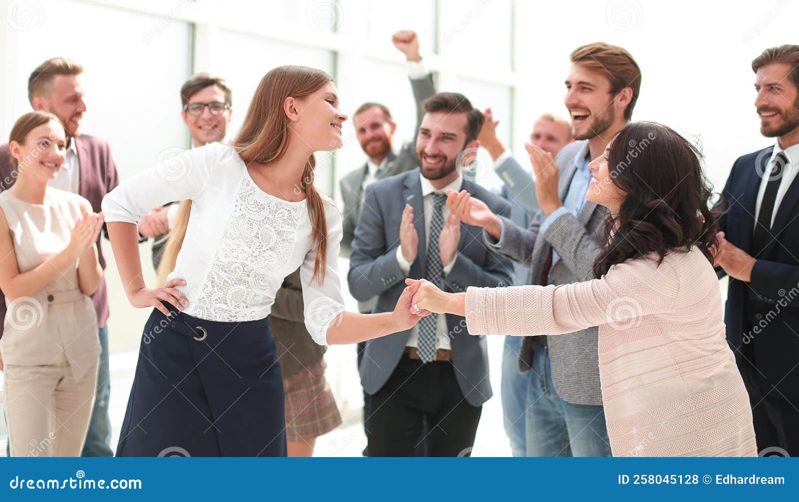 Young Employees Congratulating Each Other on the Victory Stock Photo ...