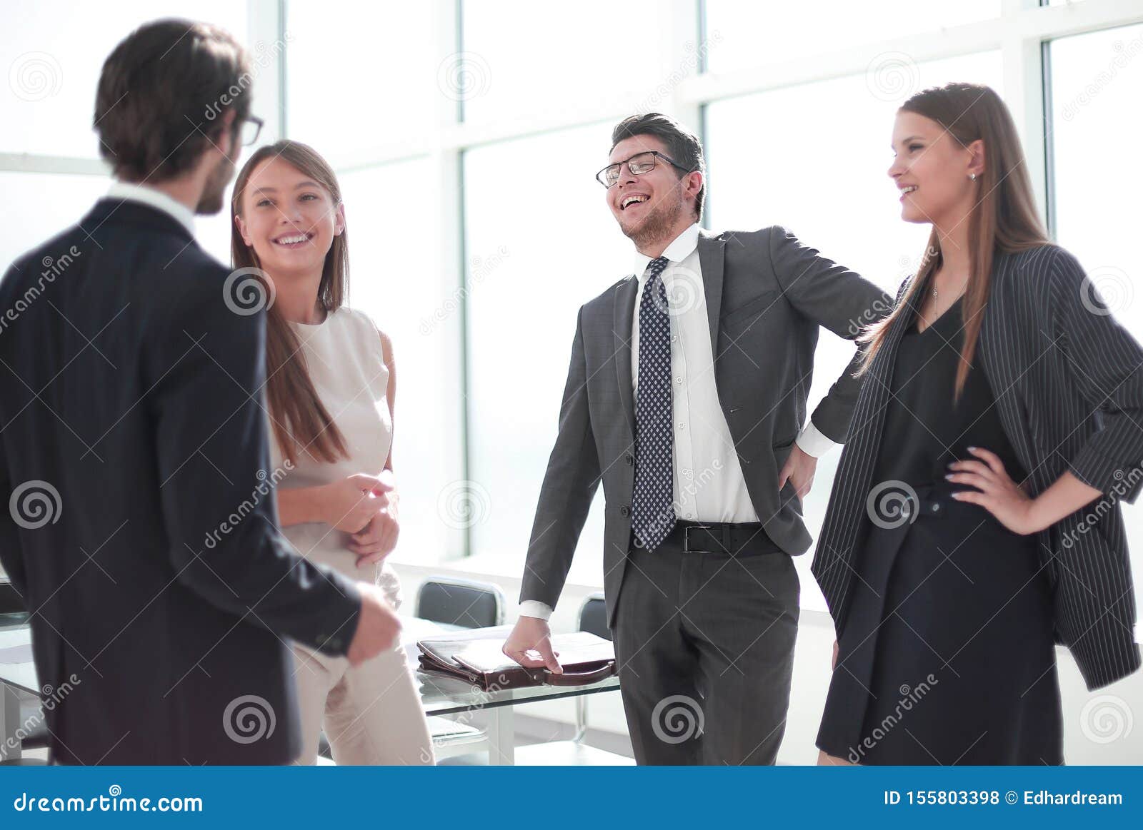 Employees Discuss Something Standing in the Office Stock Photo - Image ...