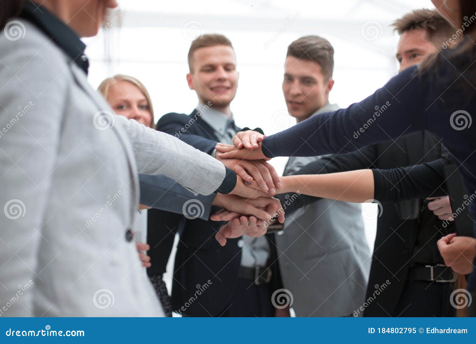 Young Employees Making a Stack Out of Their Hands Stock Image - Image ...