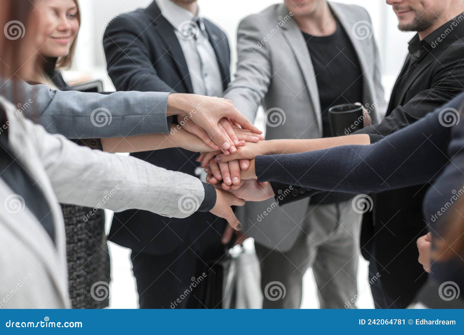 Young Employees Making a Stack Out of Their Hands Stock Image - Image ...