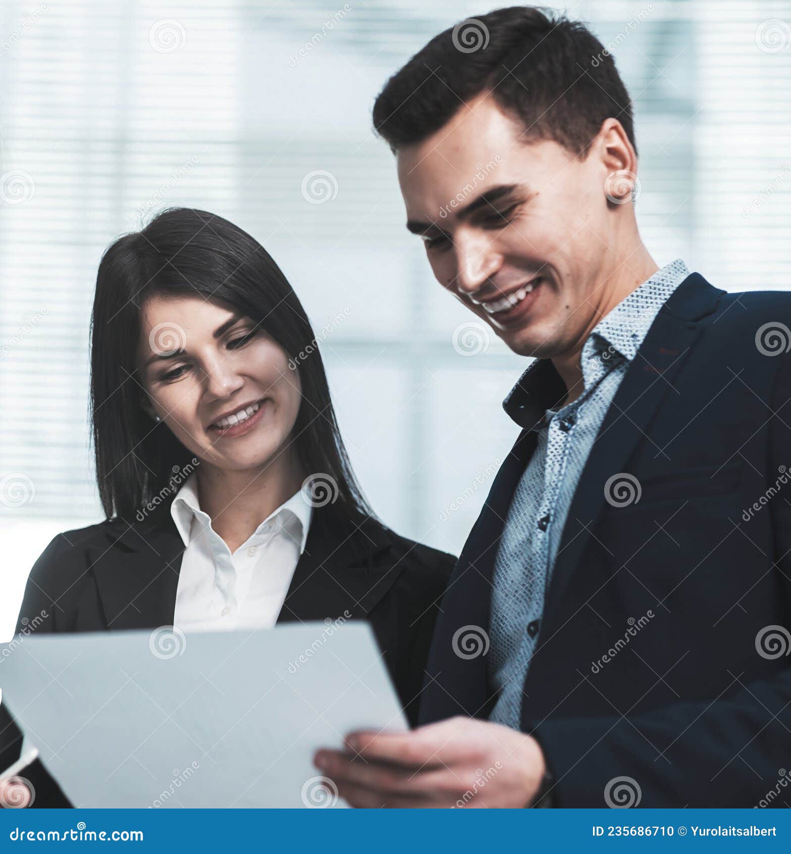 Young Employees Talk Standing in the Office. Stock Photo - Image of ...