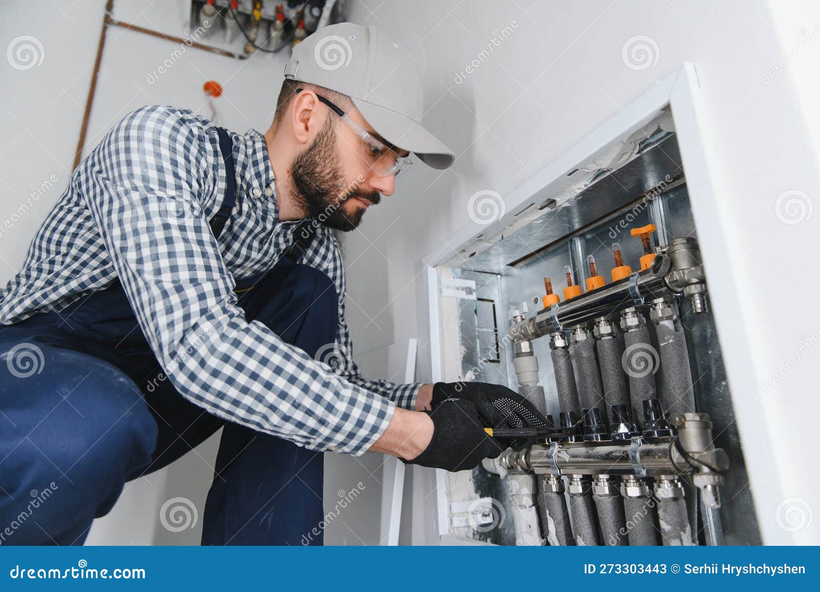 Young Engineer Adjusting Autonomous Heating Stock Image - Image of ...