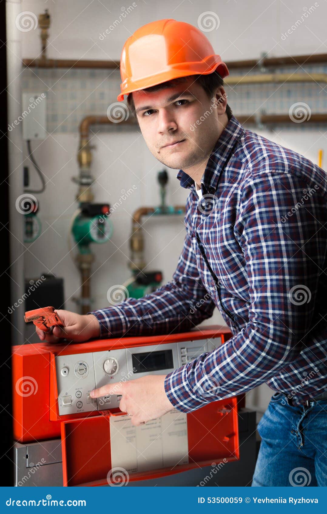 Young Engineer Adjusting System Work on Control Panel Stock Image ...