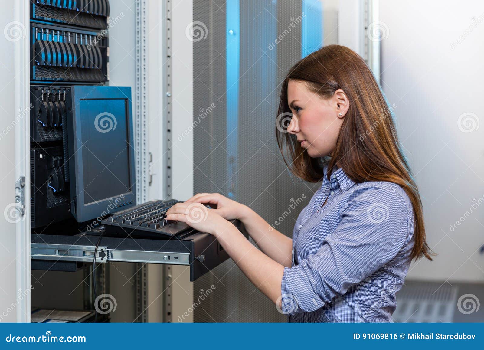 Young Engineer and Businesswoman with the Management Console Stock ...