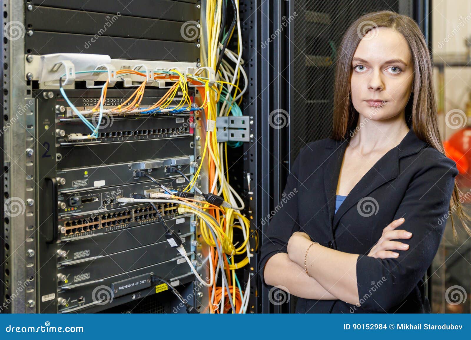 Young Engineer and Businesswoman at the Network Equipment Stock Photo ...