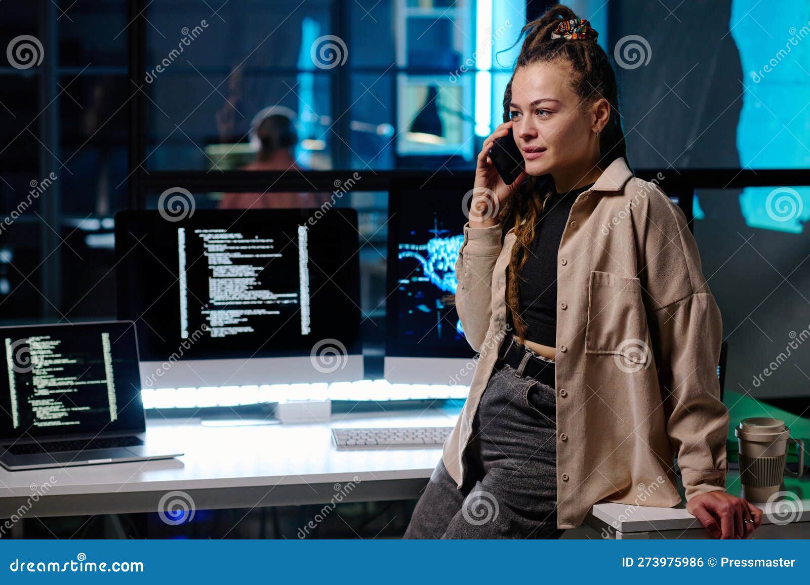 Young it Engineer Consulting Client on Mobile Phone while Standing by Workplace Stock Photo ...