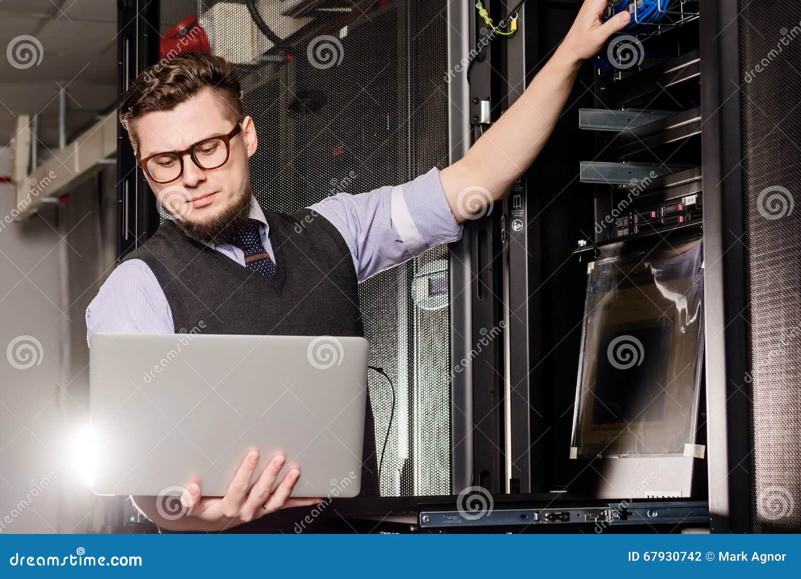 Young Engineer in a Datacenter Stock Photo - Image of businessman, data ...