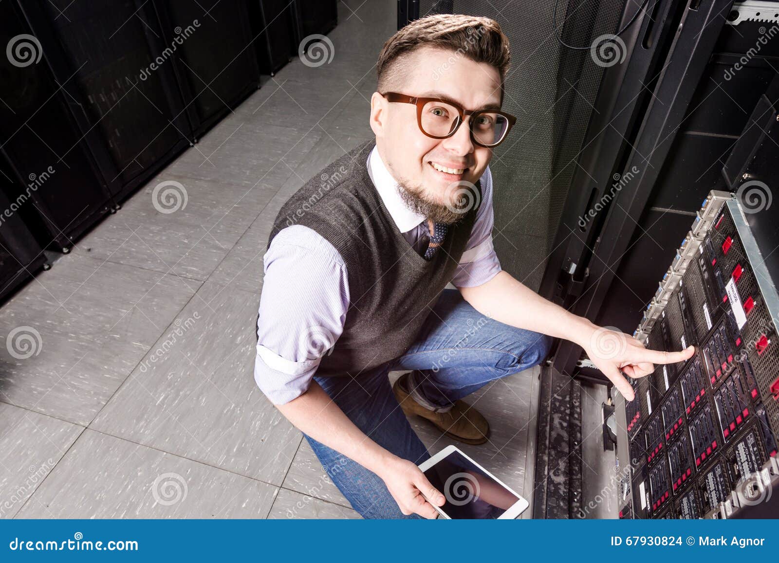 Young Engineer in a Datacenter Stock Photo - Image of business, male ...