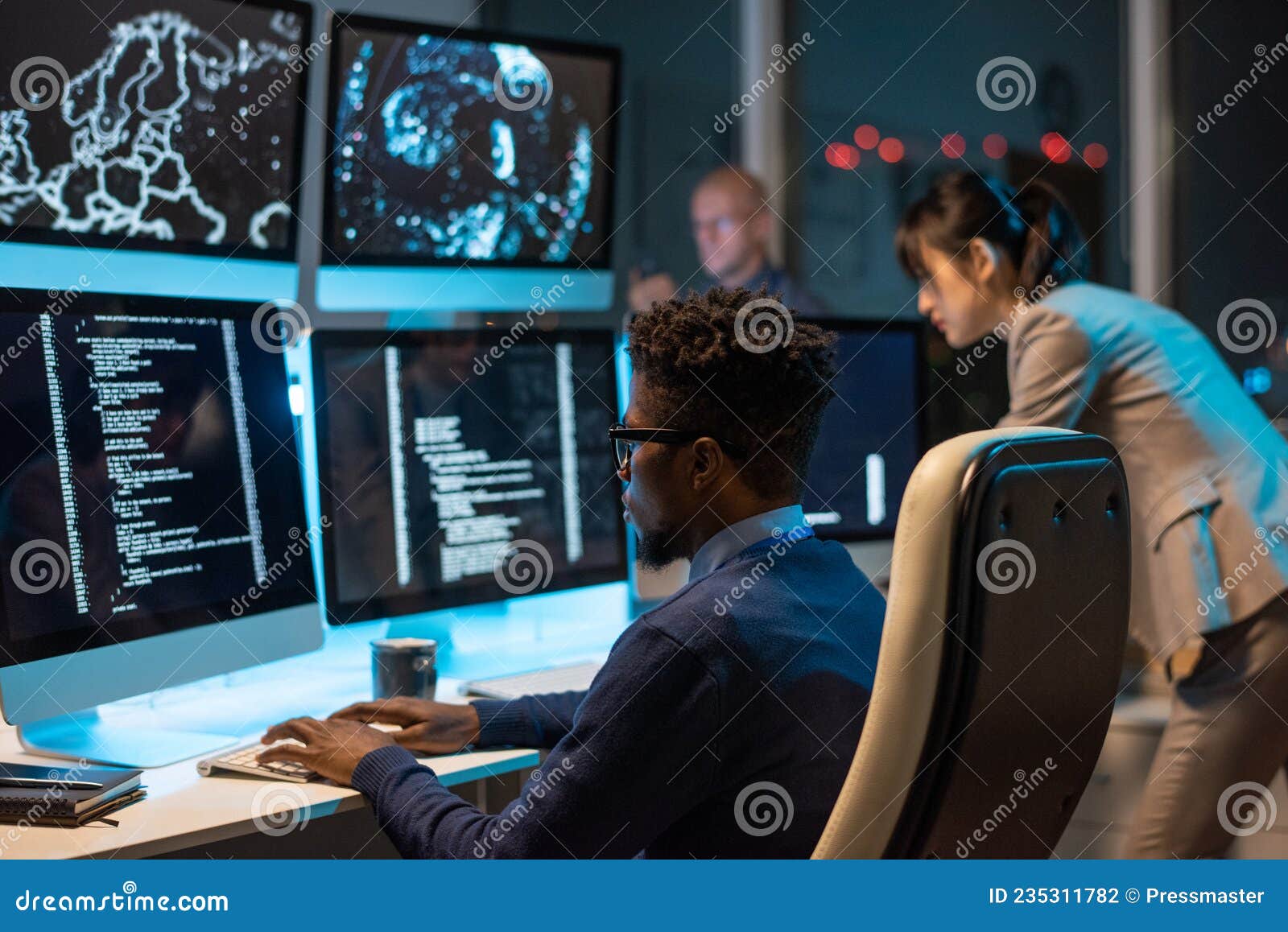 Young it-engineer Decoding Data while Sitting in Front of Computers ...