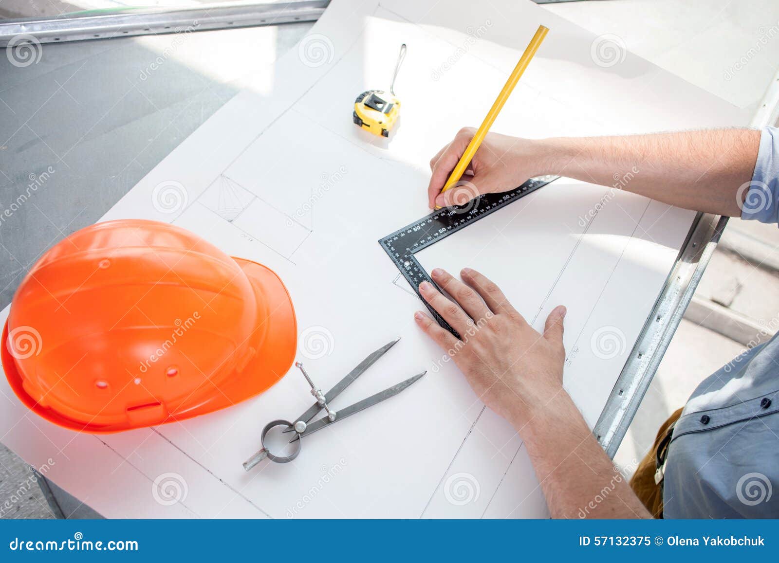 Young Engineer is Designing a Plan of Construction Stock Image - Image ...