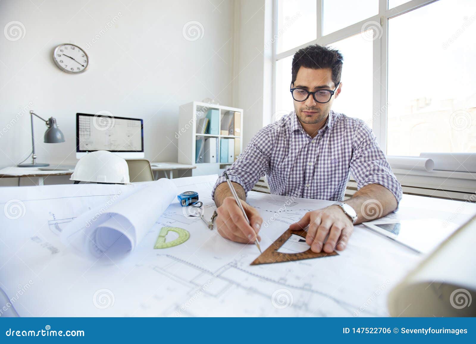Young Engineer Drawing Plans Stock Photo - Image of civil, contemporary ...