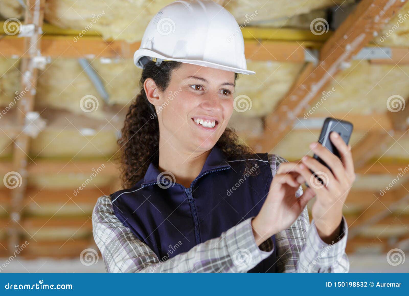 Young Engineer Girl Reading Messages on Smartphone Stock Photo - Image ...