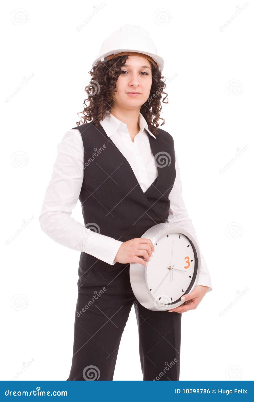 Young Engineer Holding a Clock Stock Photo - Image of meeting, hand ...