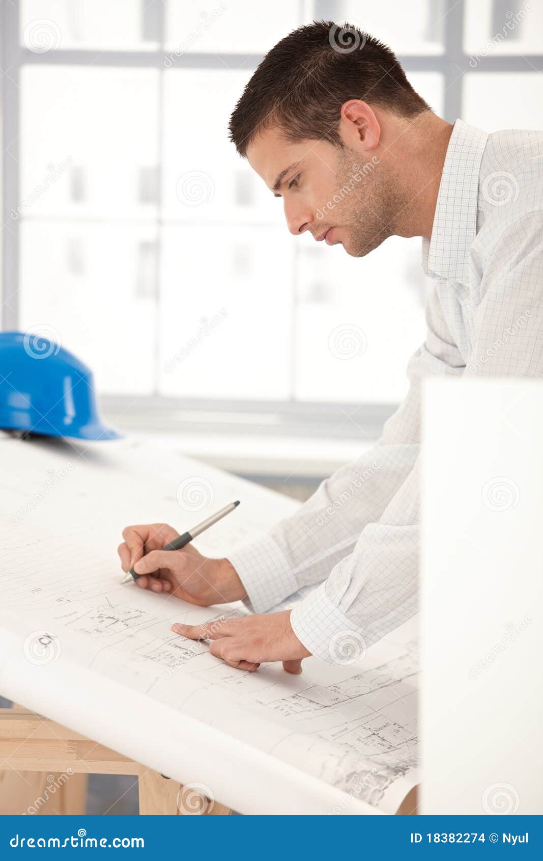 Young Engineer Making Plans Stock Photo - Image of blueprint, indoor ...