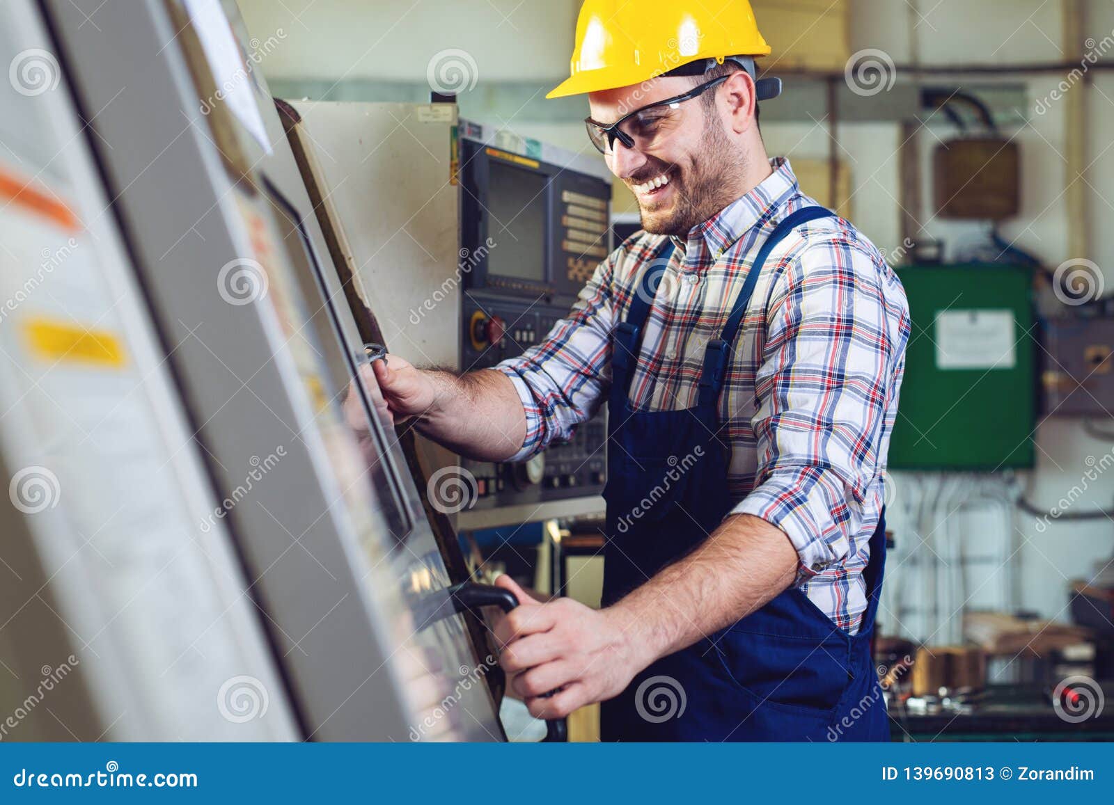 Engineer Operating CNC Machinery in Factory Stock Image - Image of ...