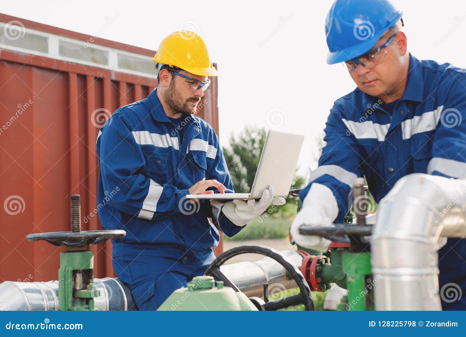 Engineer Power and Energy Using Laptop on Location Site Stock Photo ...