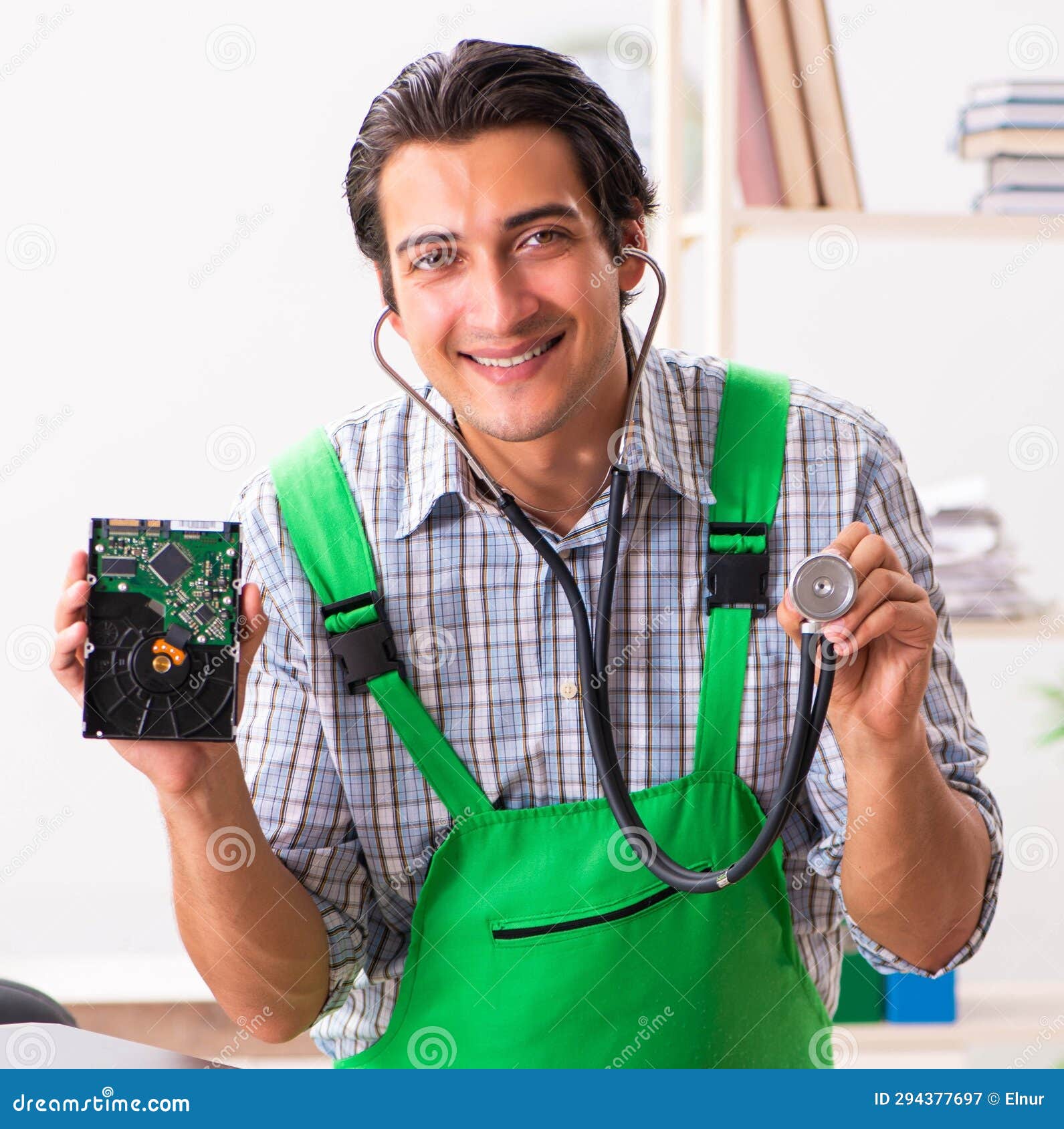 Young Engineer Repairing Broken Computer at the Office Stock Image ...