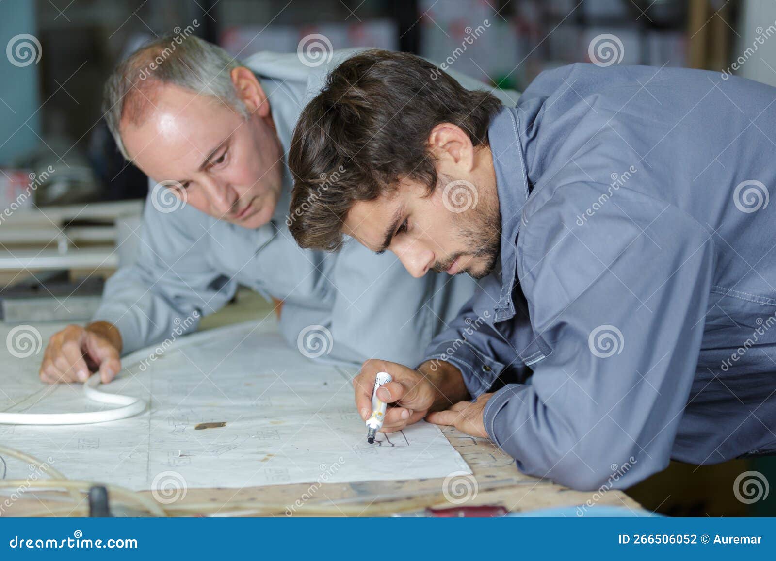 Young Engineer with Teacher Stock Photo - Image of businessperson, male ...
