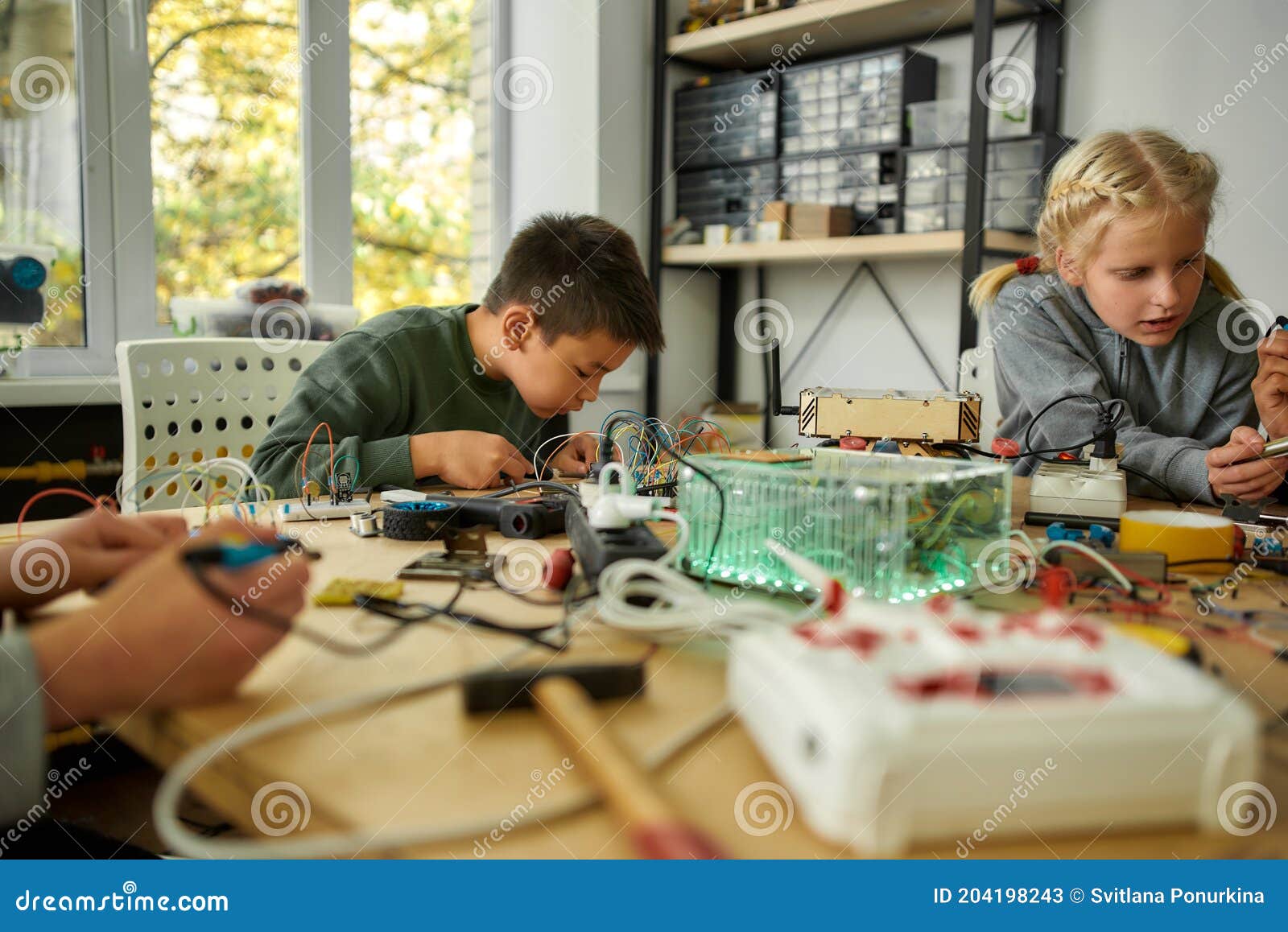 You Dream it, I Make it. Young Engineer Using Soldering Iron To Join ...