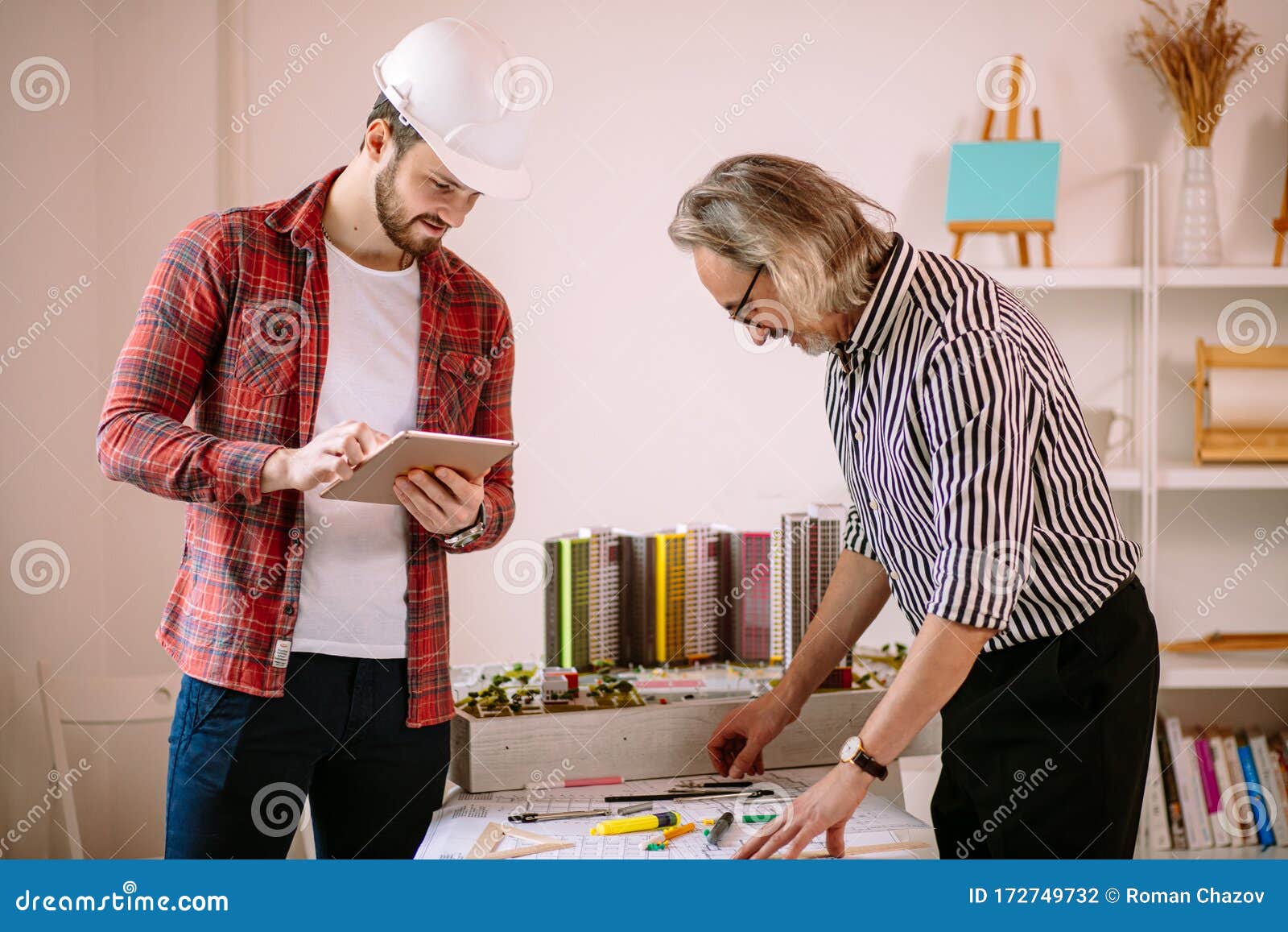 Young Engineer Work with Senior Architect in the Office Stock Photo ...