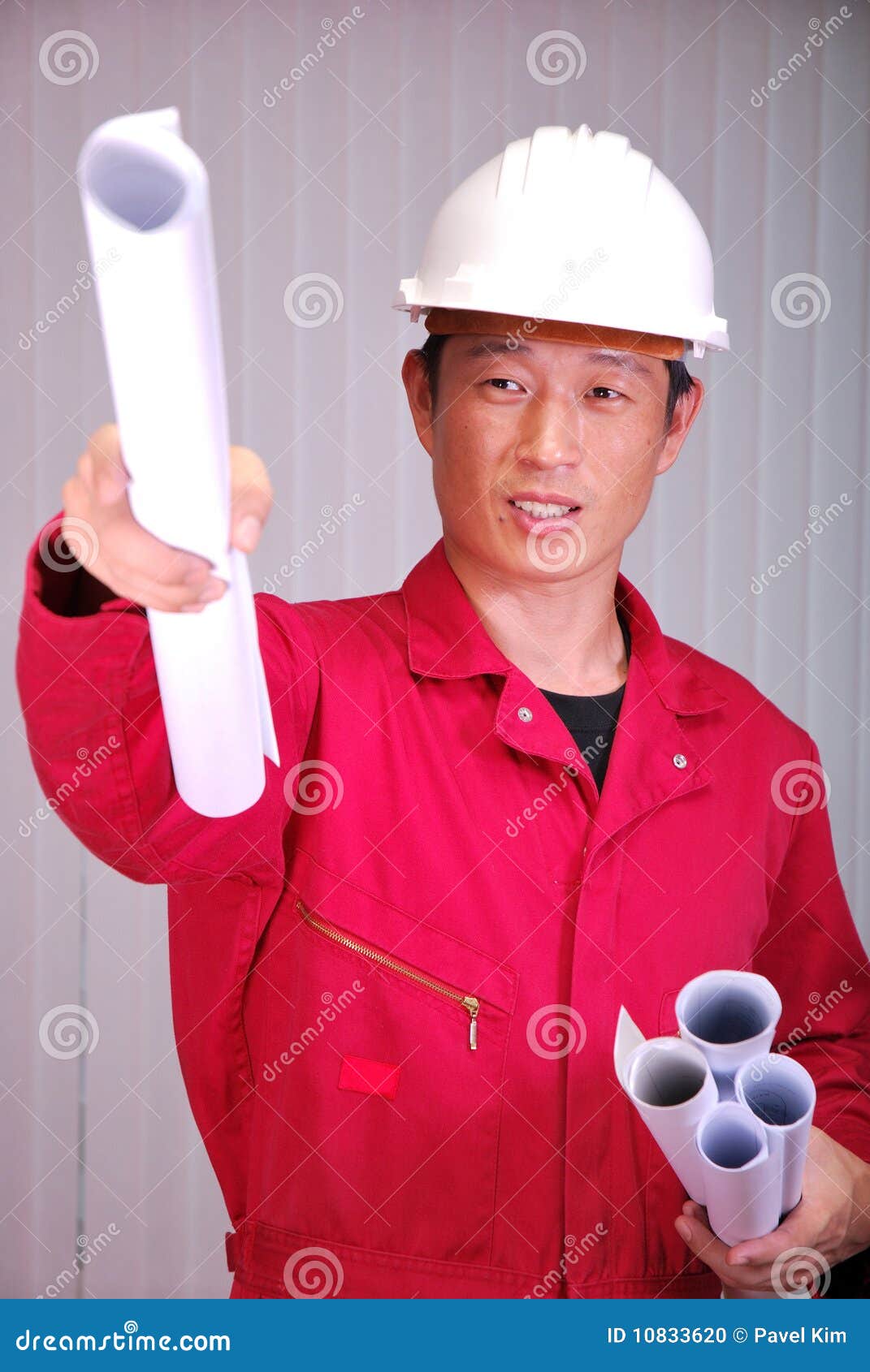 The Young Engineer, the Worker in Red Uniform Stock Photo - Image of ...