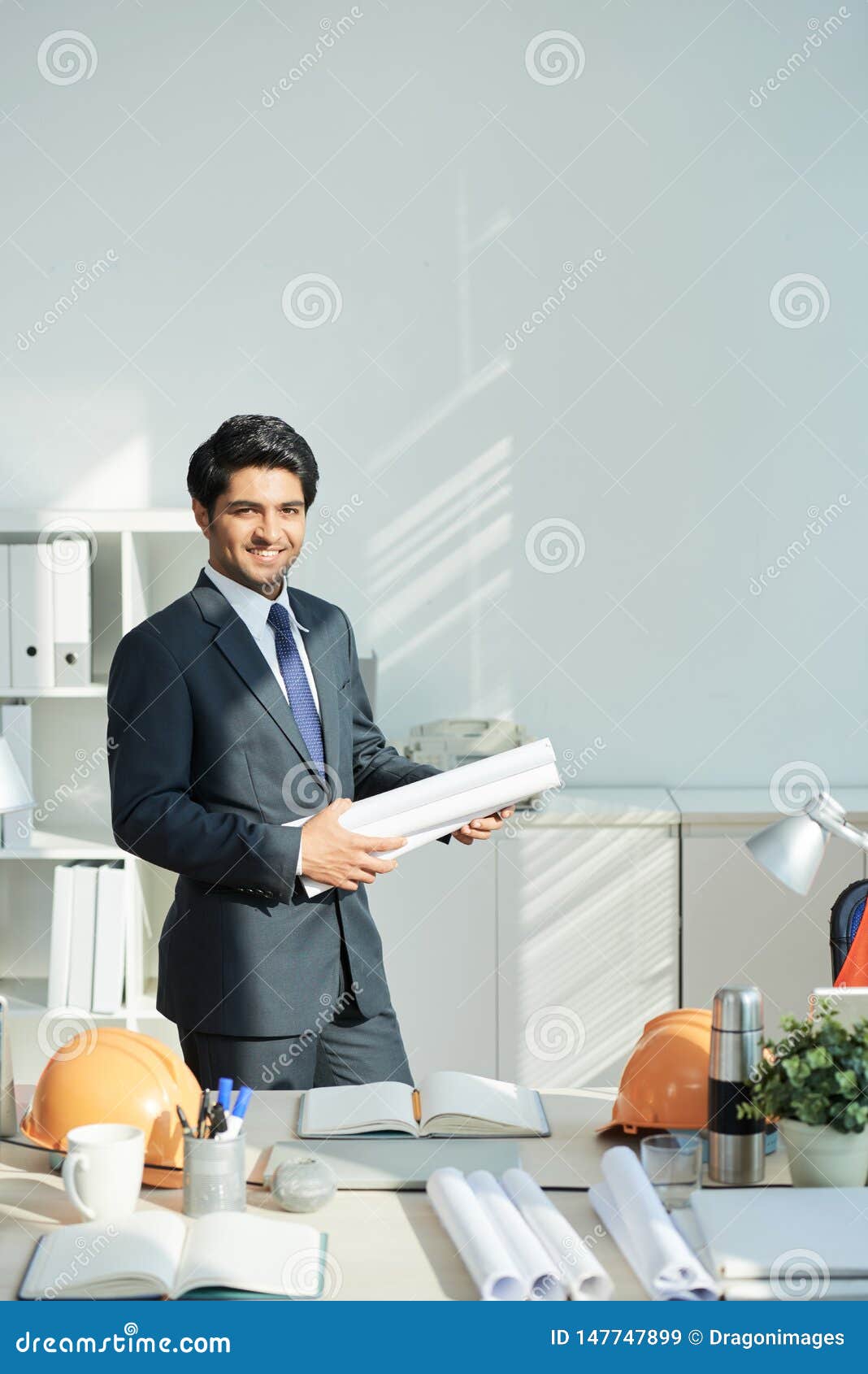 Young Engineer Working with Blueprints at Office Stock Image - Image of ...