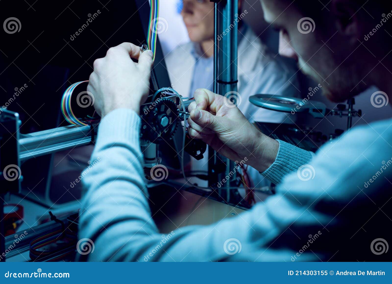 Young Engineer Working on a 3D Printer Stock Image - Image of dark ...