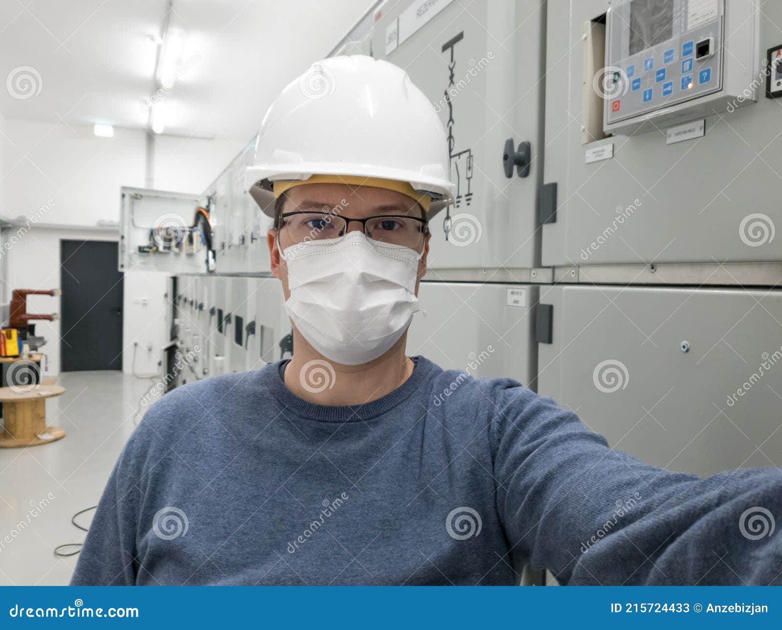 Young Engineer Working in Electrical Substation Wearing a Face Mask ...