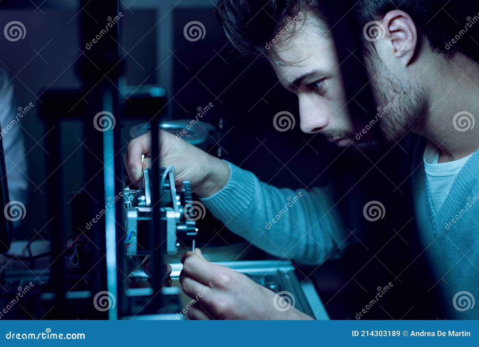 Young Engineer Working on a 3D Printer Stock Image - Image of printing ...