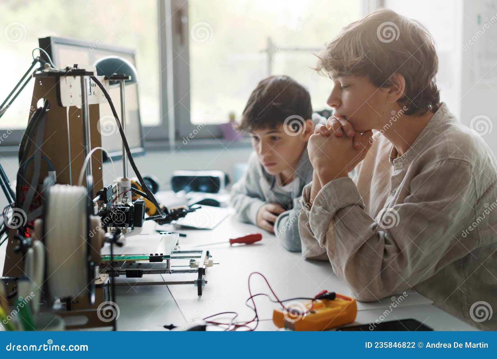 Young Engineering Students Using a 3D Printer Stock Photo - Image of ...