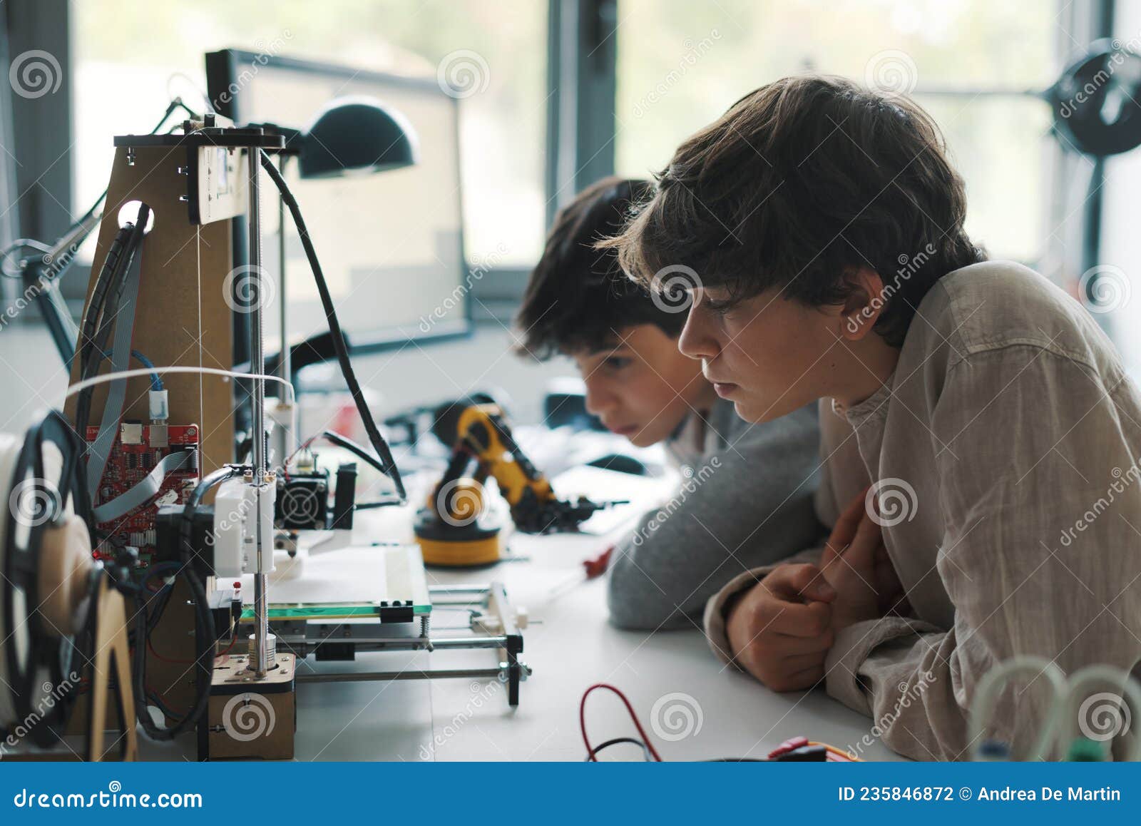 Young Engineering Students Using a 3D Printer Stock Photo - Image of ...